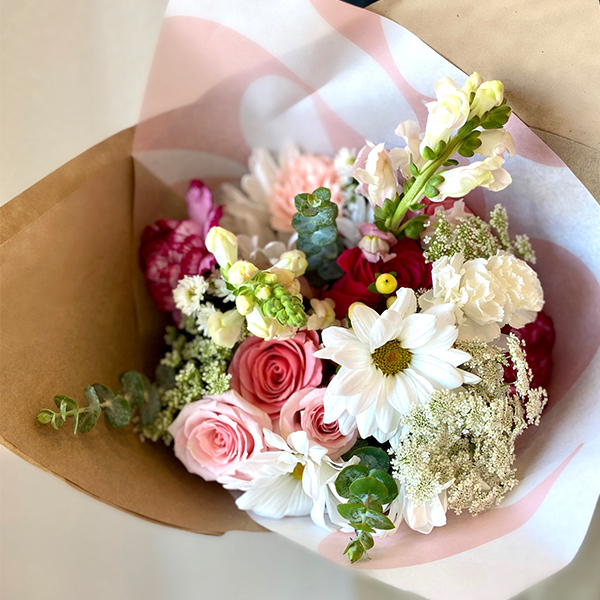 // Wrapped Flowers * Houston Florist Isidora Flowers & Gift Shop